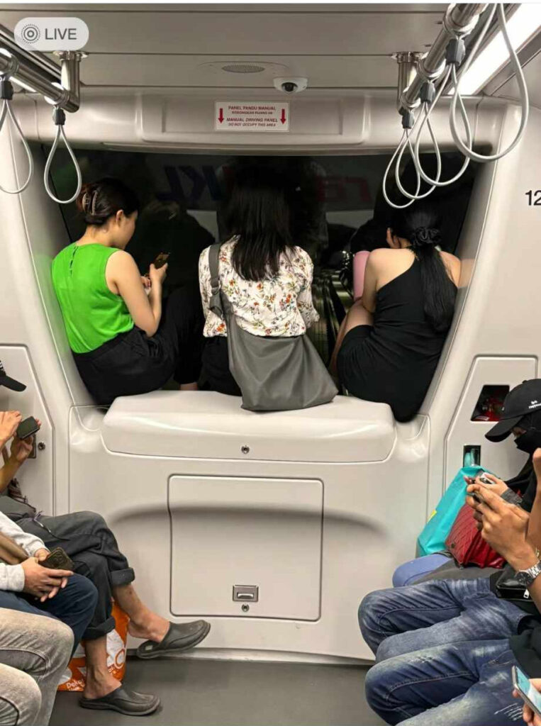 3 Women Spotted Sitting On Train's Panel During LRT Commute - Hype Malaysia